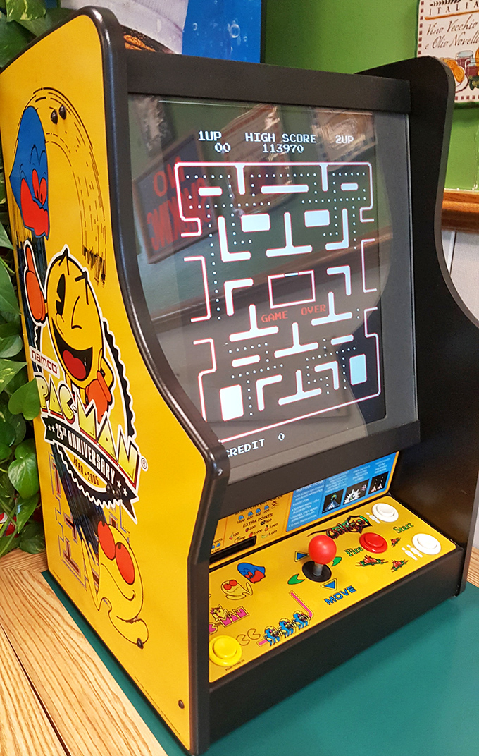 The vintage Pac-Man cabinet isn't just nostalgic decoration &ndash; it's where kids wait while parents order and where adults pretend they're waiting for kids.