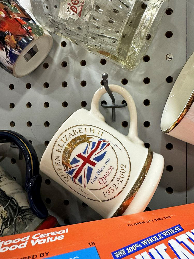 Royal memorabilia that survived the journey from souvenir to collectible. This Queen Elizabeth II mug has outlasted many breakfast tables on its way here.