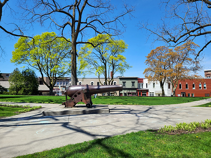 This vintage cannon holds court in a downtown park, a quirky historical touchstone amid Petoskey's manicured green spaces.