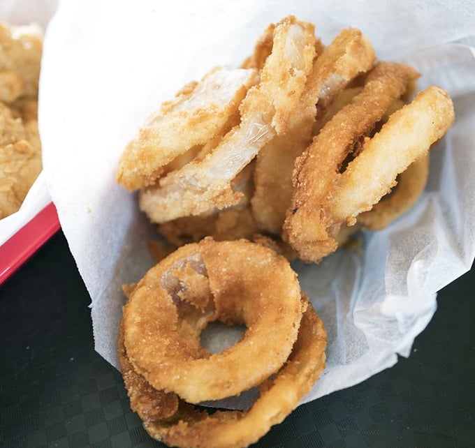 Onion rings with architectural integrity that would make Frank Lloyd Wright proud &ndash; substantial enough to stand up to any dipping sauce.