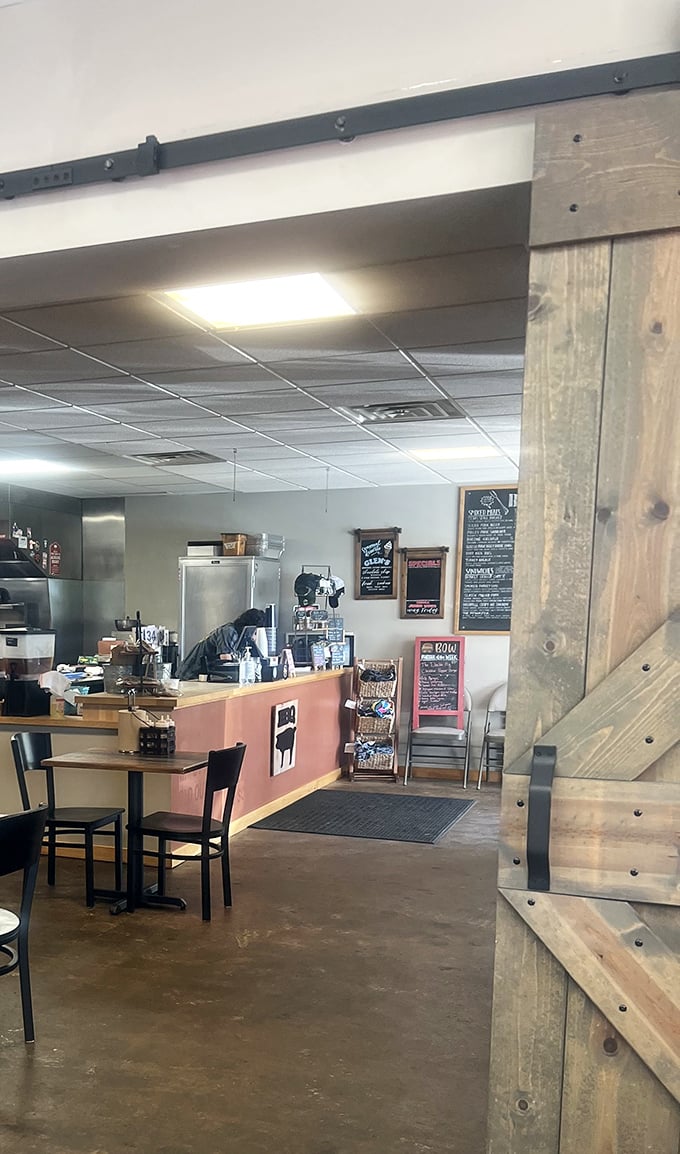 Where barbecue dreams begin their journey to your plate. The rustic barn door adds that perfect touch of authenticity to the ordering experience.