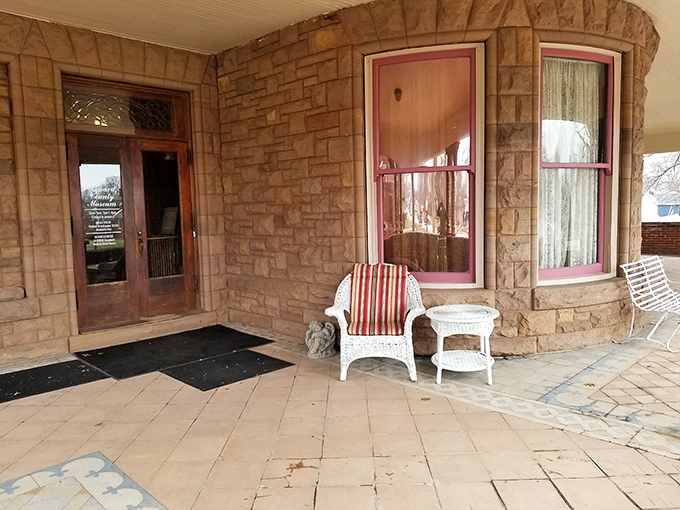 The mansion's porch offers a perfect perch for watching the world go by—at approximately one-eighth the speed of today's hustle.