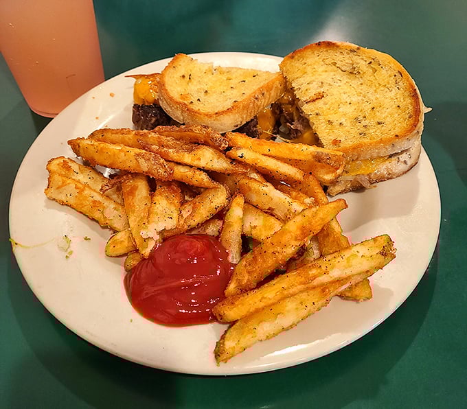 The patty melt&mdash;that glorious marriage of burger and grilled cheese&mdash;executed with the kind of precision that makes you wonder why you'd ever order anything else.