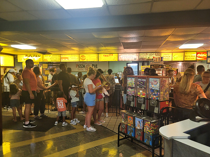 The intermission dash&mdash;that beautiful chaos of moviegoers racing to secure snacks before the feature presentation resumes.