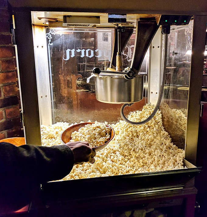 Fresh popcorn machine adds that nostalgic movie theater charm to your dining experience at Plymouth Tavern.