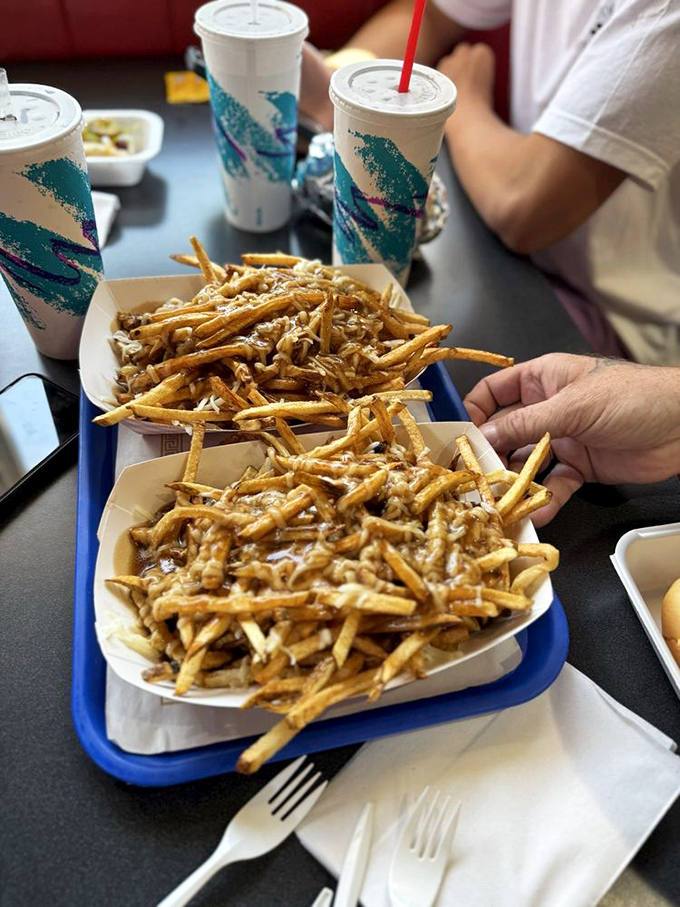 Golden fries with a generous dusting of parmesan&mdash;proof that sometimes the supporting actors steal the scene from the main characters.