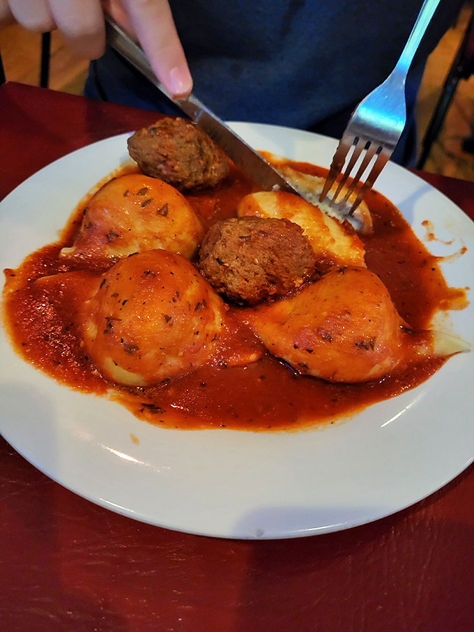 Ravioli and meatballs bathed in rich tomato sauce&mdash;the kind of dish that makes conversation stop and eyes close in appreciation with the first bite.