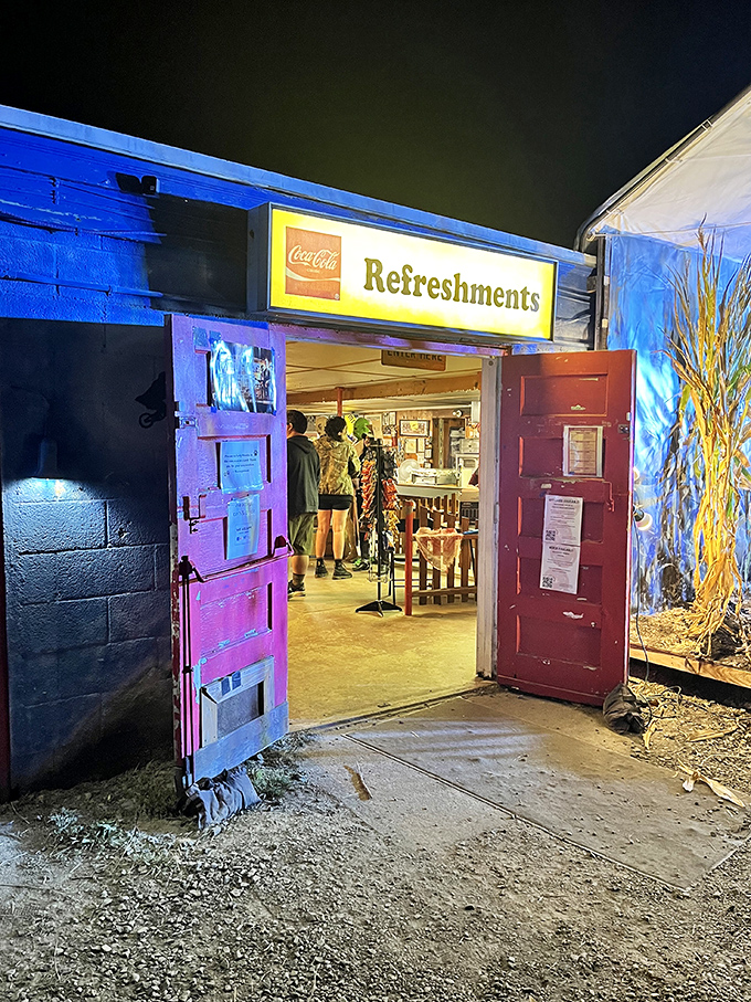 The refreshment stand's colorful doors swing open to reveal a treasure trove of classic movie snacks and memorabilia.