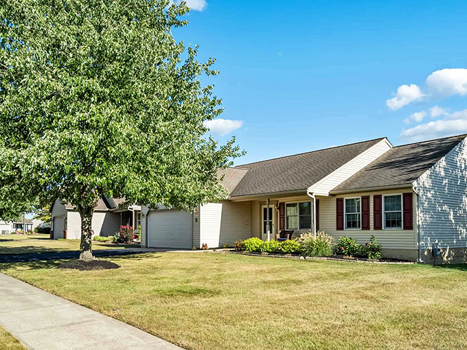 Single-story living that says "I'm done with stairs forever" without sacrificing curb appeal. The landscaping whispers "low-maintenance" in the sexiest way possible. 