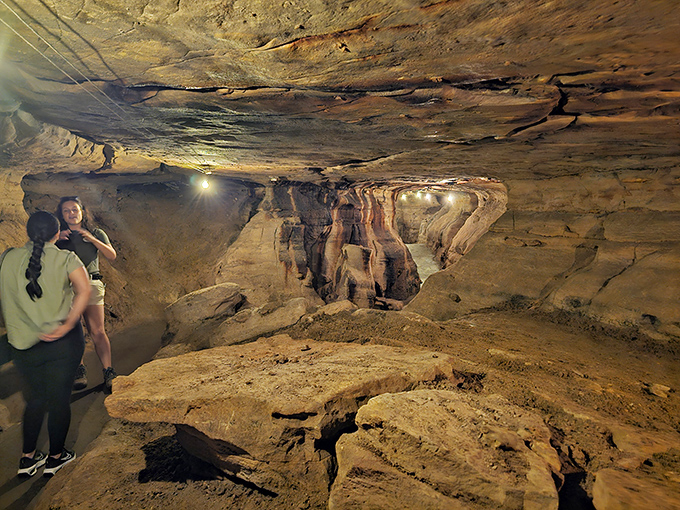Like frozen waterfalls caught in mid-cascade, these flowing rock formations tell stories of water's patient artistry over countless centuries.
