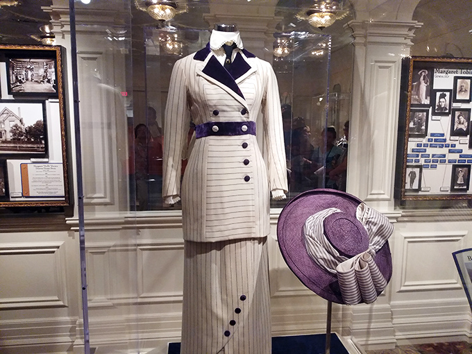 More than just a costume&mdash;this striking white and purple ensemble represents the height of 1912 fashion and the social status of its wearer.