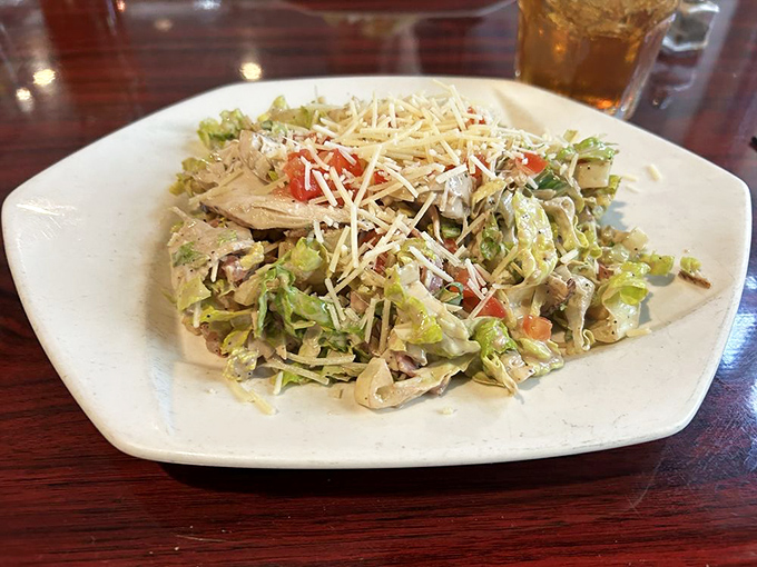 Even the salads at Kelly's refuse to be boring supporting characters—this chicken creation plays a starring role with fresh ingredients and perfect balance.