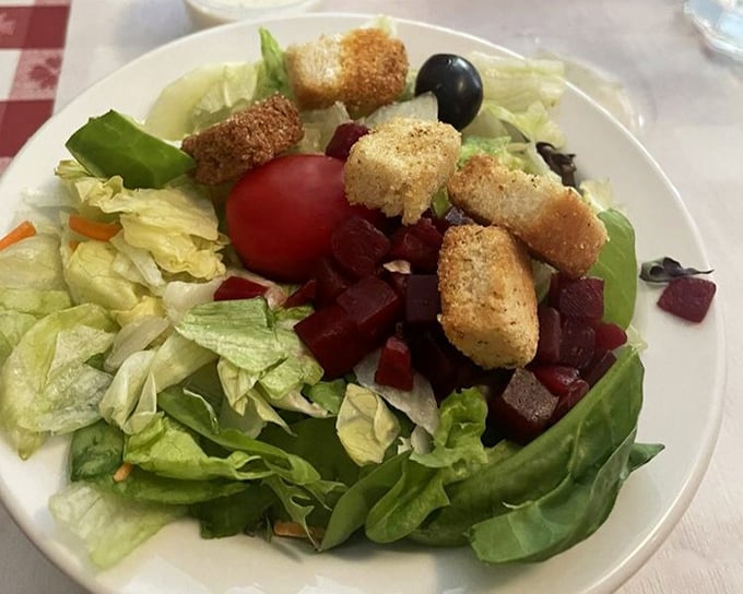 A garden-fresh salad with croutons and beets that proves vegetables can hold their own at an Italian feast.