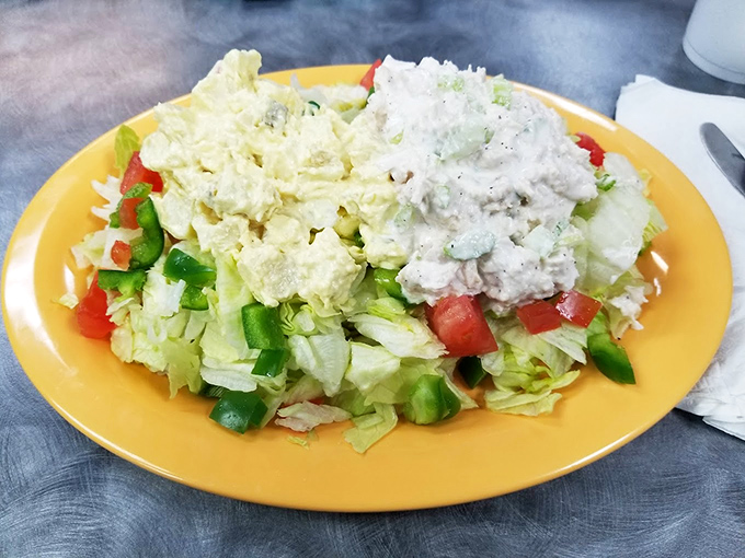 A salad that doesn't apologize for being a salad. Fresh, crisp, and colorful&mdash;proof that vegetables can hold their own on a menu famous for indulgence.