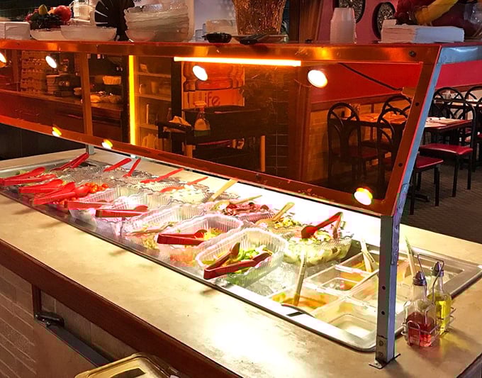 The salad bar &ndash; where health-conscious intentions go to negotiate with your appetite. Those vibrant colors are nature's way of saying "eat me."