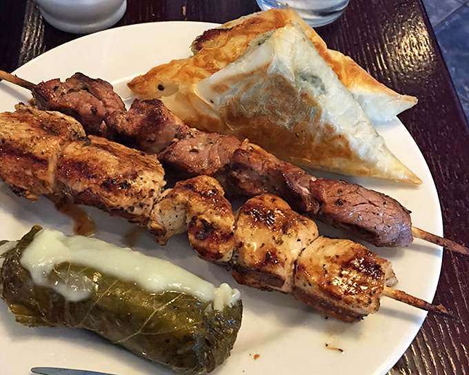 A plate that solves indecision&mdash;skewers of perfectly grilled meats, a dolmade standing at attention, and triangles of phyllo that shatter with each bite.