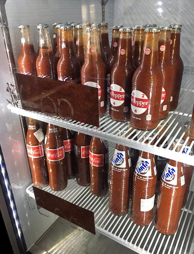 The refrigerator of happiness&mdash;where classic sodas in glass bottles wait to wash down your smoky feast with nostalgic fizz.