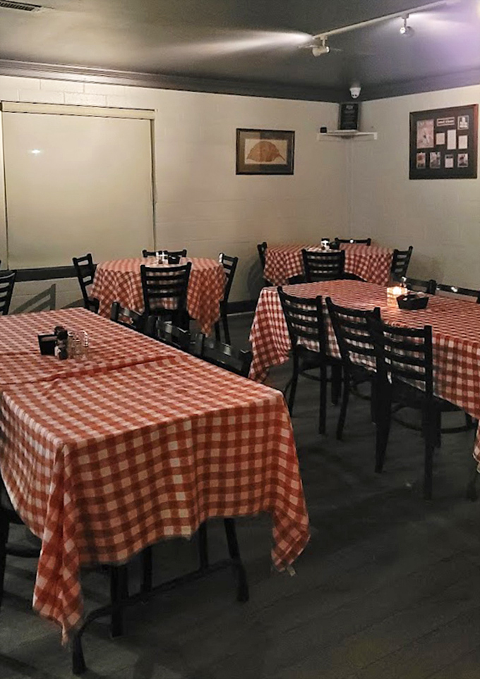 The dining room waits expectantly for the evening rush. Each table a blank canvas ready for masterpieces of meat to be served.