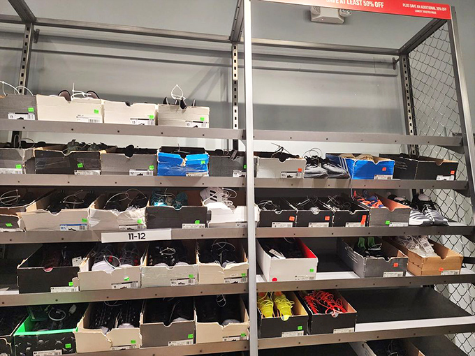 The shoe section at the Nike Factory Store&mdash;a wall of possibilities where last season's models cost less than a tank of gas.