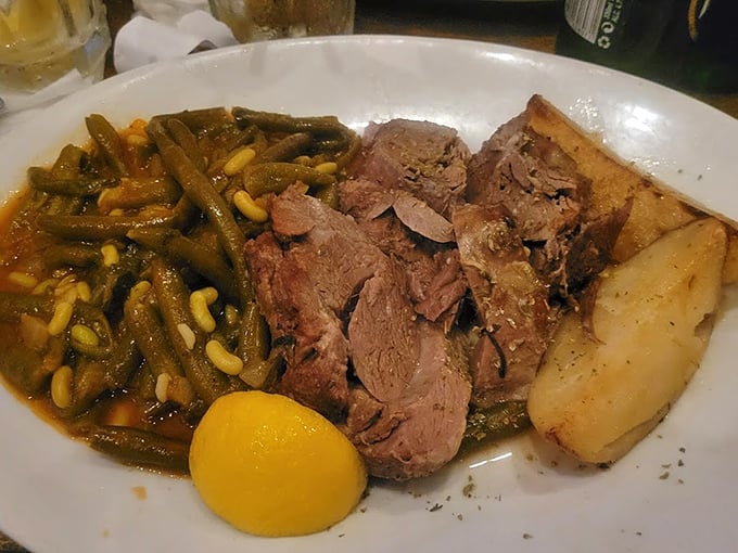 Slow-roasted lamb falls apart at the mere suggestion of a fork, accompanied by potatoes that have soaked up all those magnificent meat juices.