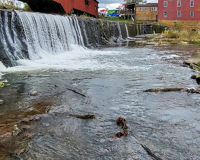 The waterfall beneath the mill isn't just picturesque&mdash;it's functional art, powering grinding stones just as it has for nearly two centuries