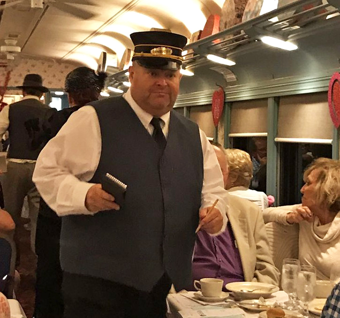 The conductor brings theatrical flair to the journey, part transportation professional, part entertainer, all committed to your memorable experience.