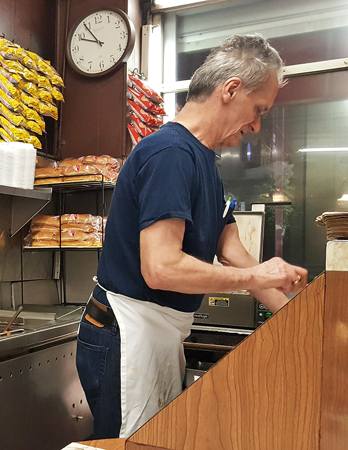 Behind every great diner is someone who knows exactly what they're doing, moving with the practiced efficiency that comes from thousands of perfect plates.