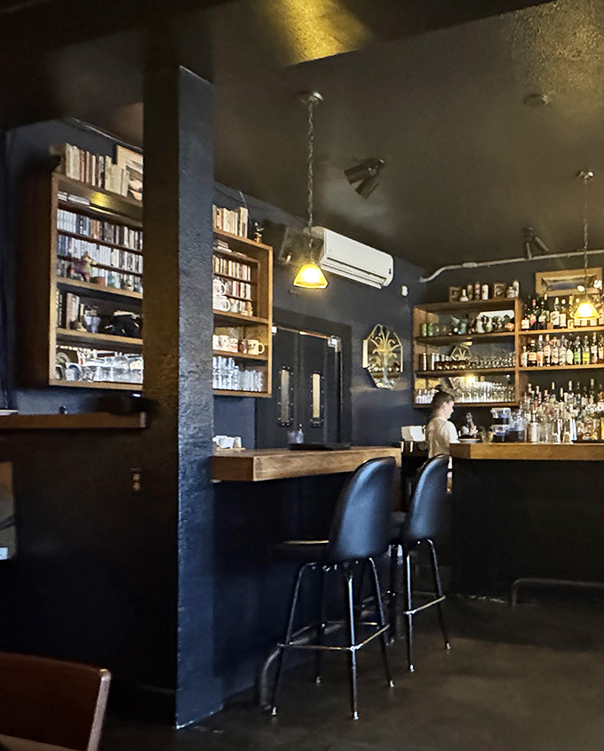 The bar area isn't just well-stocked; it's a liquid library where the bartenders are the knowledgeable, friendly librarians of booze.