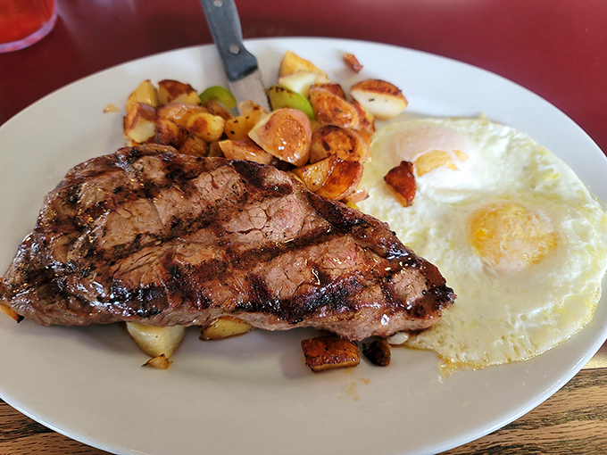 A steak that's seen just the right amount of flame, paired with sunny-side-up eggs that wink at you from across the plate.