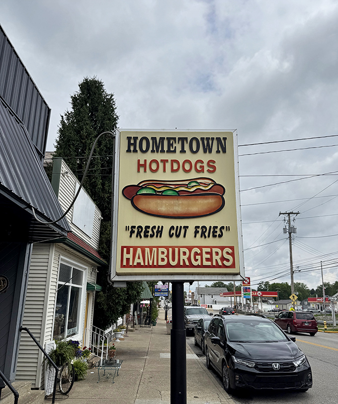 The vintage sign proudly announces Hometown Hot Dogs' presence to the world &ndash; no neon, no gimmicks, just the promise of good eating.