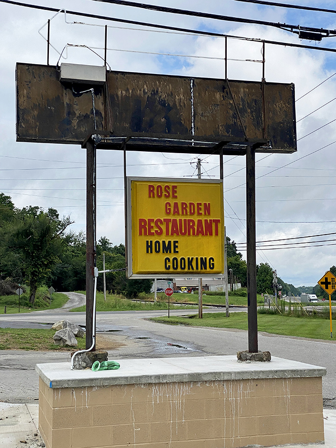 The roadside sign promises "HOME COOKING" - two words that still have the power to make you pull over immediately.