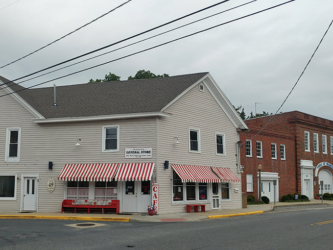 A classic general store with red-and-white awnings that practically screams "homemade pie and local gossip inside!"