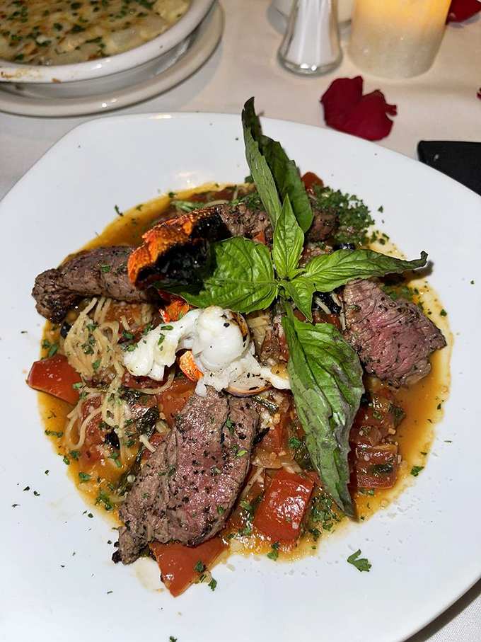 Surf meets turf in a pasta dish that couldn't decide what it wanted to be when it grew up. Tender steak, seafood, and pasta in harmonious rebellion.