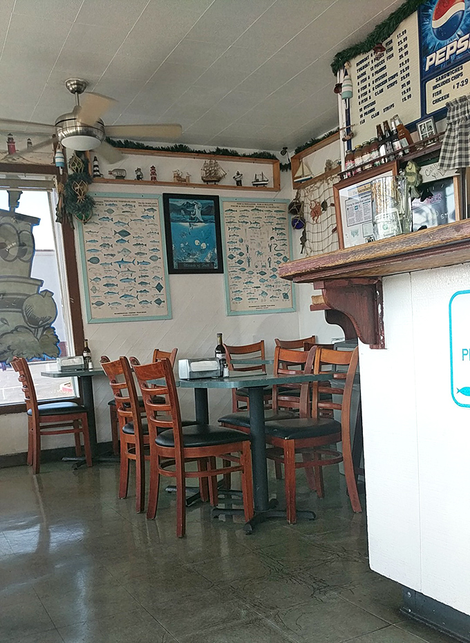 Simple wooden chairs and fish identification charts on the wall – because when the food is this good, fancy décor would just be a distraction.