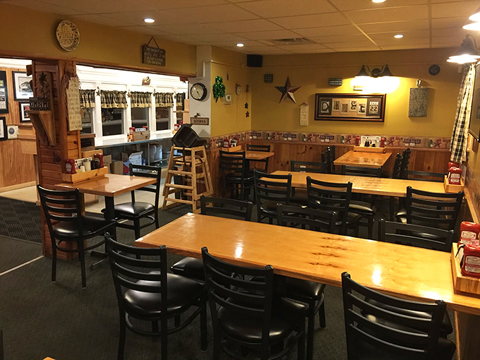 Wooden tables worn smooth by decades of elbows, conversations, and coffee cups tell stories between the grain.