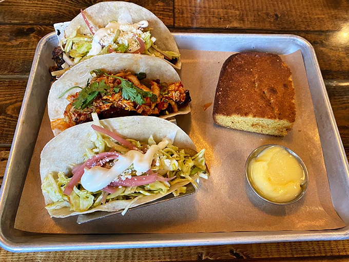 Tacos meet barbecue in this flavor fiesta, while that cornbread with honey butter deserves its own fan club.