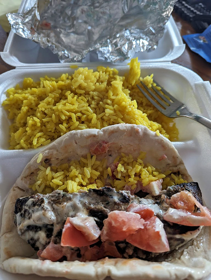 The gyro in its takeout glory&mdash;proof that some of life's greatest pleasures don't require fancy china or cloth napkins to be magnificent.