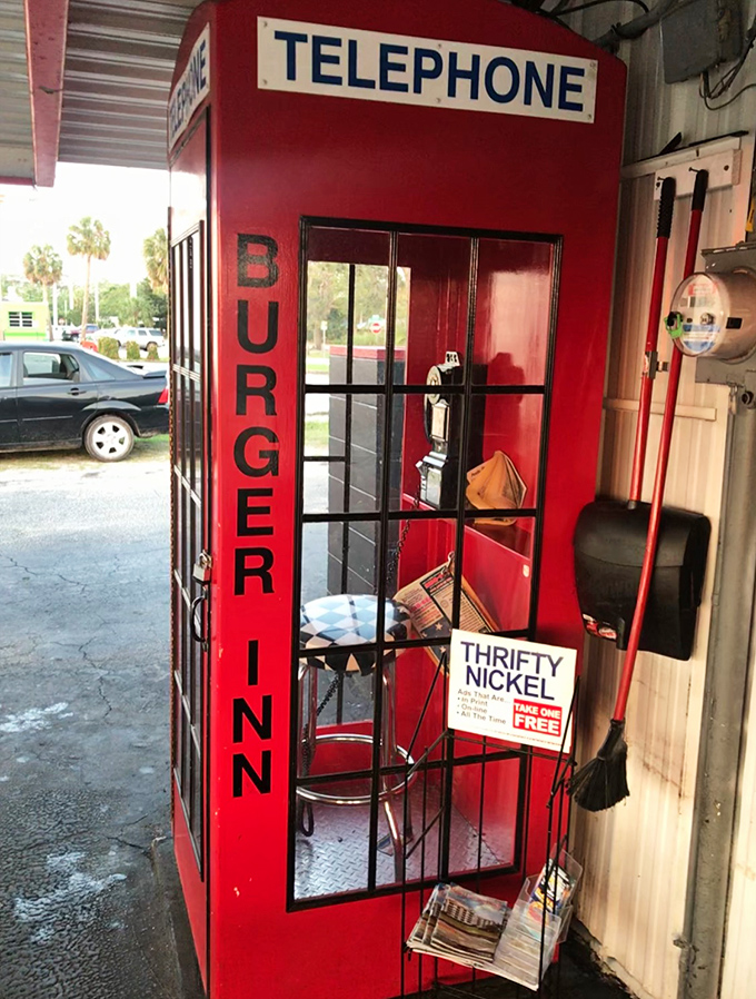 Superman had phone booths for quick changes; Burger Inn has them for quick calls. A charming relic from when "mobile" meant something entirely different.