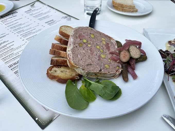 The terrine&mdash;a mosaic of meat that's essentially p&acirc;t&eacute;'s more sophisticated cousin&mdash;arrives with perfectly toasted bread and house-made pickles.