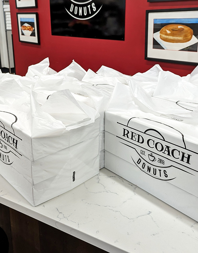 Those pristine white boxes hold promises of happiness&mdash;like little treasure chests where X marks the spot for "excellent donuts here."