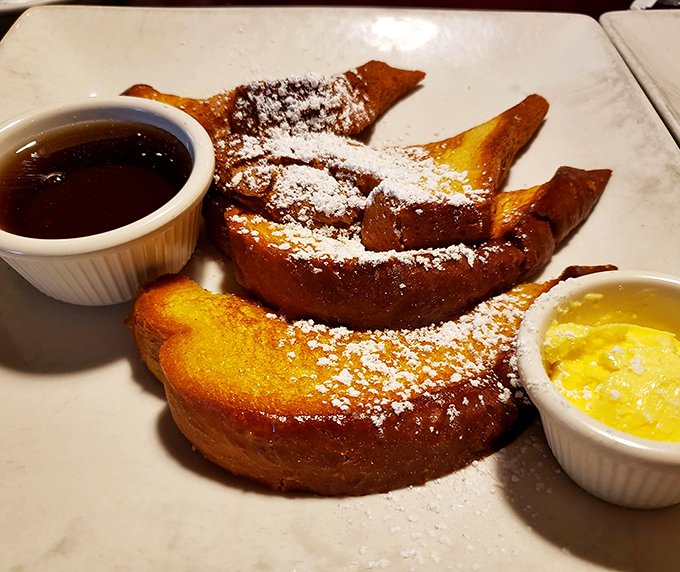 French toast that makes ordinary breakfast feel like amateur hour. That powdered sugar dusting isn't just garnish&mdash;it's the final touch of morning perfection.