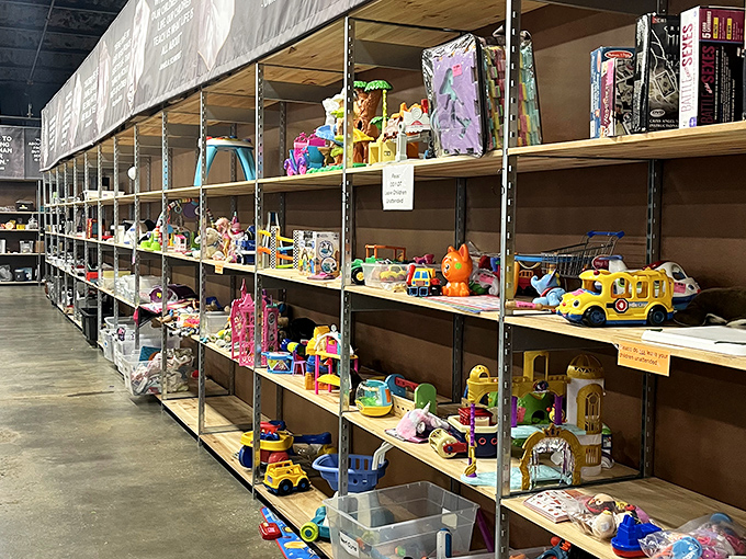 The toy section: where childhood memories are recycled, and parents silently thank previous owners for the 90% discount on plastic noise-makers.