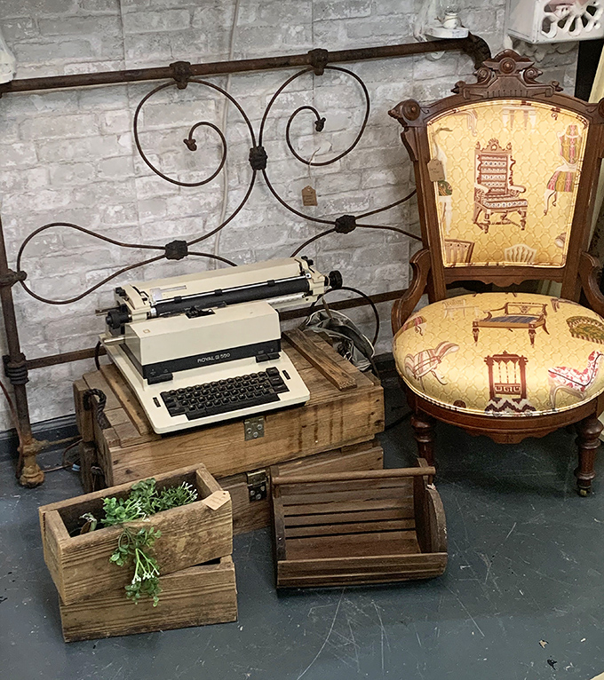 A vintage typewriter waiting for its next great American novel, paired with a chair upholstered in what can only be described as "furniture optimism."