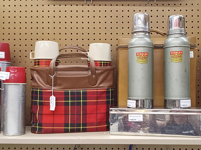 Vintage thermoses and plaid picnic gear stand ready for adventures that never went out of style, just waiting for their next road trip.