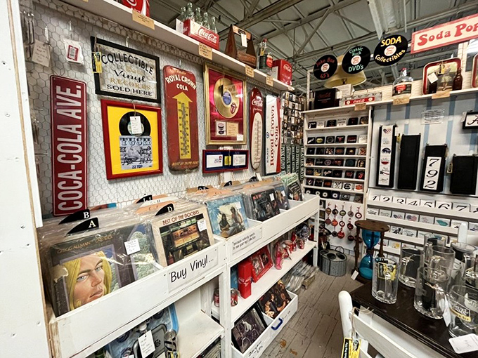 Vinyl records and Coca-Cola memorabilia create the perfect soundtrack for your journey through American pop culture history.