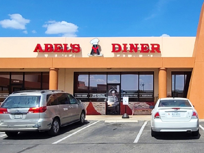 Abel's Diner's cheerful sign and chef logo promise home cooking that'll make you forget your troubles.