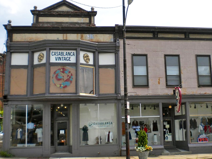 Casablanca Vintage's historic storefront window offers a glimpse into fashion's past, like a time capsule on Cincinnati's street corner.