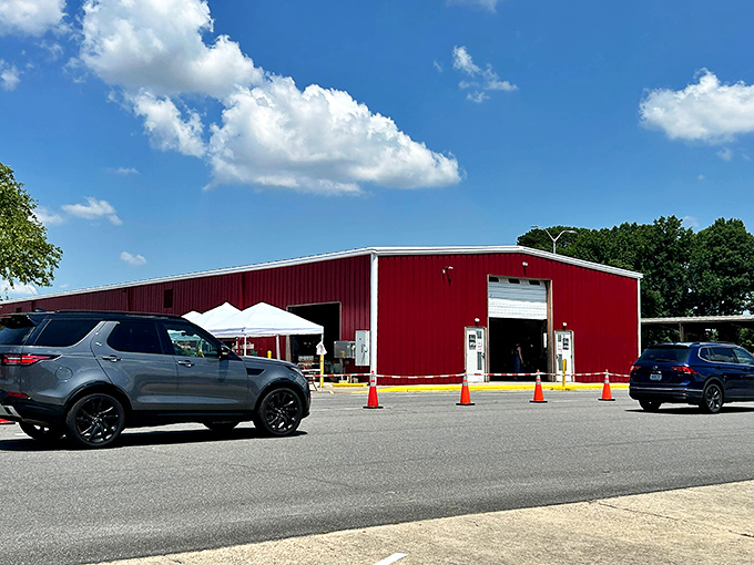 The impressive red barn exterior of Charlotte Regional Farmers Market promises big discoveries inside waiting.