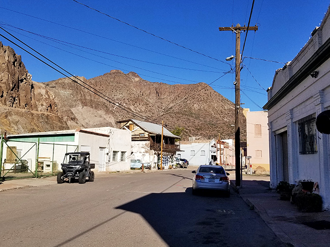 Clifton's white-washed buildings huddle beneath mountains that stand guard over some of Arizona's most affordable dining and shopping experiences.