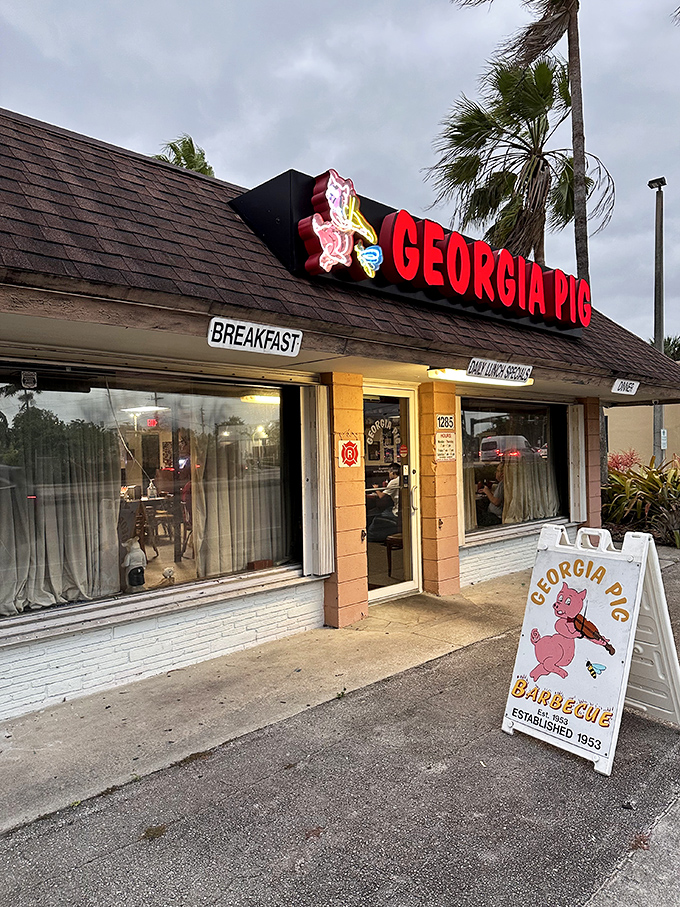 Georgia Pig's cheerful mascot and classic diner look announce decades of barbecue tradition served with a smile.